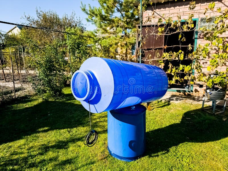 Cleaning of a Drinking Water Container. a Blue Plastic Container for ...