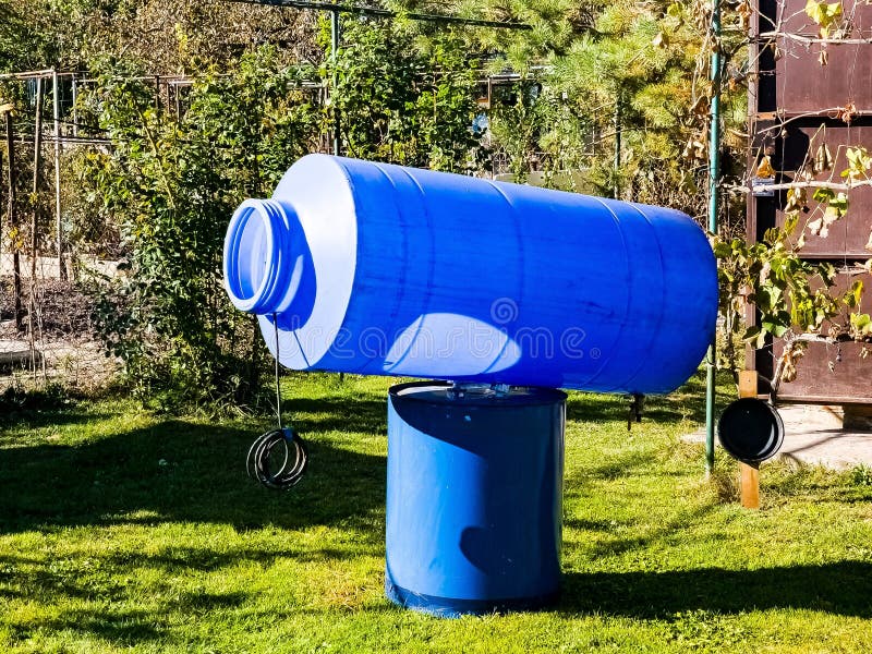 Cleaning of a Drinking Water Container. a Blue Plastic Container for ...