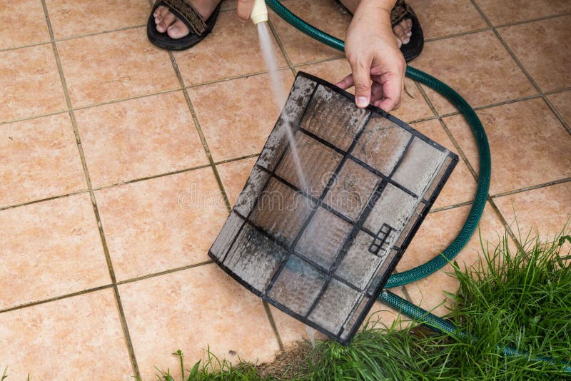 Cleaning Dust Filled Air Conditioning Unit Filters with with Water ...
