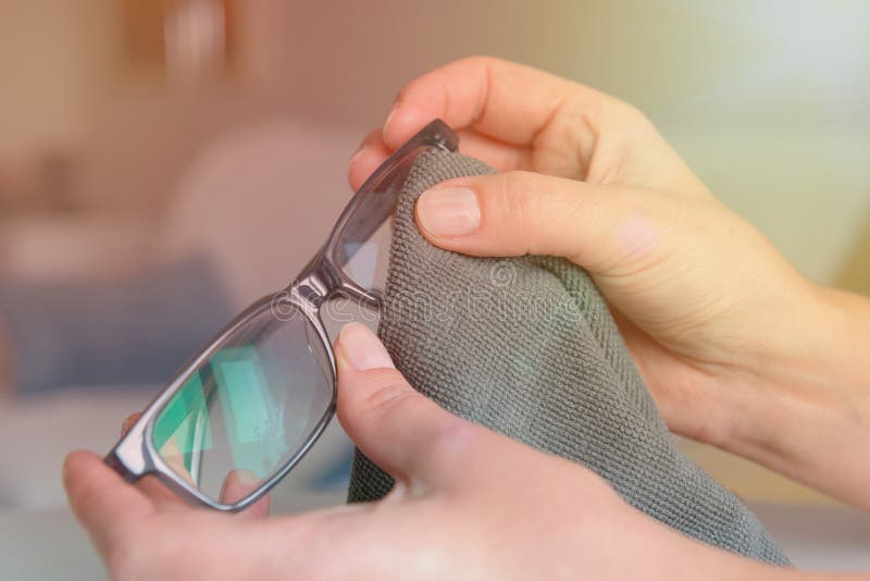 Cleaning Eyeglasses with Microfiber Cloth Stock Image - Image of lenses ...