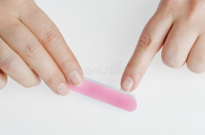 Cleaning fingernails stock image. Image of polishing - 11929881
