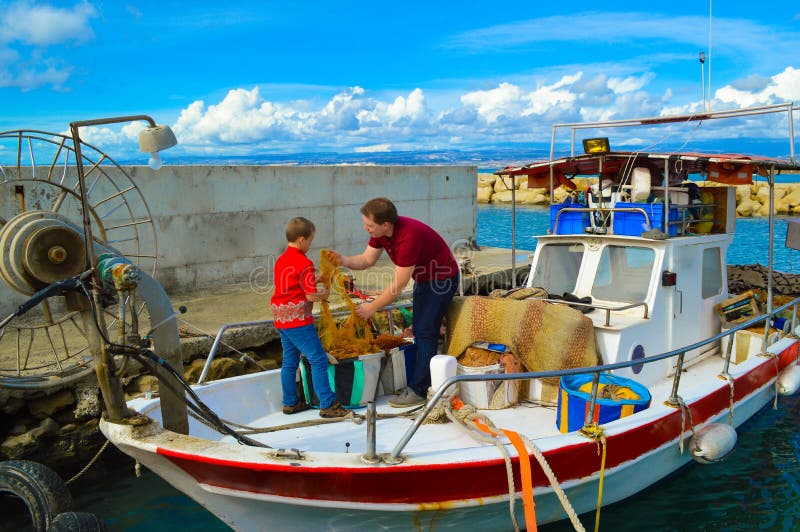 Cleaning fishing net stock photo. Image of friendship - 37886644