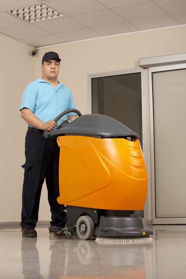 Worker Cleaning Store Floor with Machine Stock Photo - Image of ...