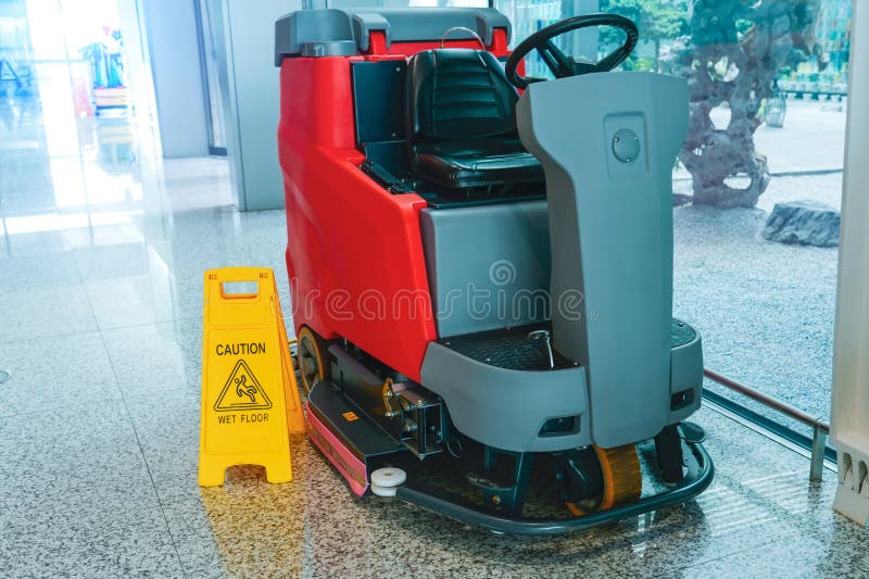 Cleaning the Floor Using a Floor Scrubber Machine. Stock Image - Image ...