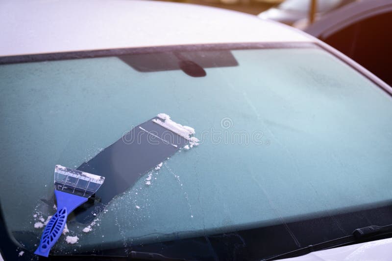 Cleaning with Frozen Windshield and Ice Scraper Stock Photo - Image of ...