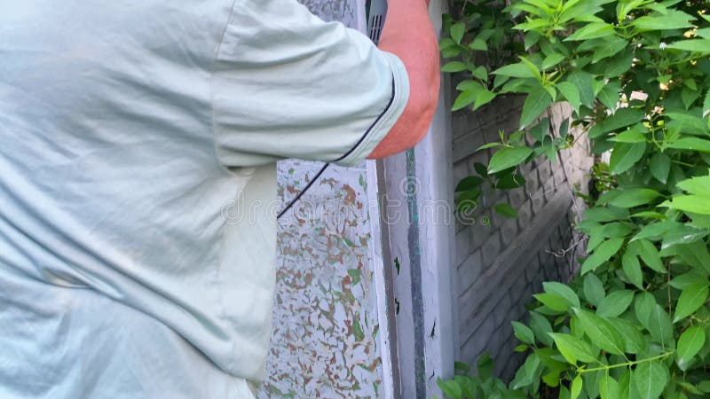 Cleaning Gates from Old Paint Stock Footage - Video of greens, grey ...