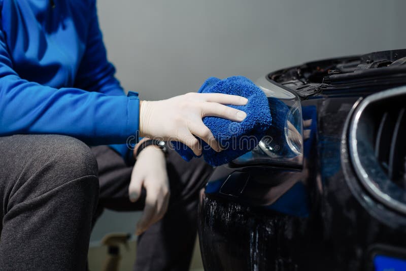 Cleaning Headlight with Microfiber Cloth, Car Lights Stock Image ...