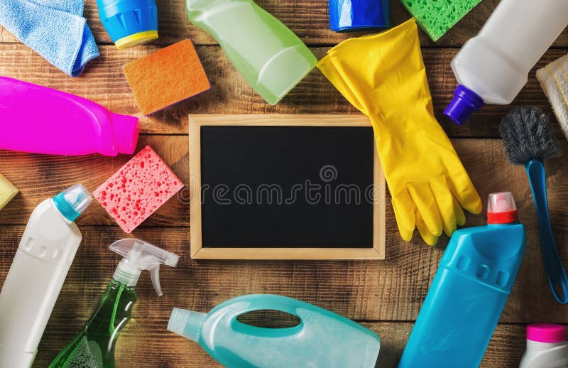 Cleaning Items with Empty Chalkboard on Wooden Table Stock Image ...