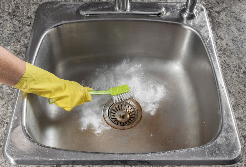 Cleaning the kitchen sink stock image. Image of household - 28035187