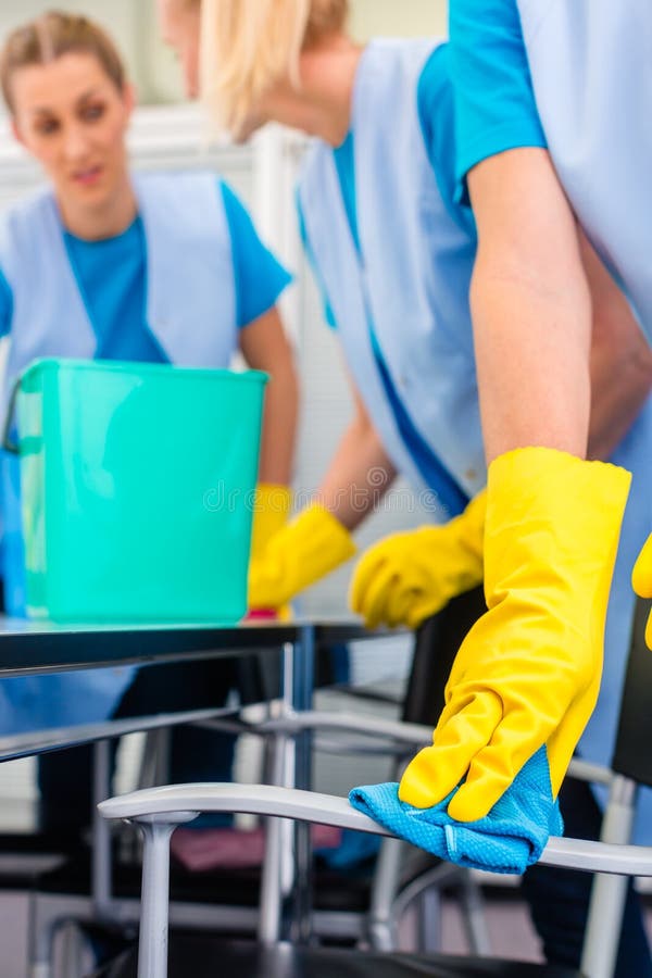 Cleaning Ladies Working As Team in Office Stock Image - Image of ...