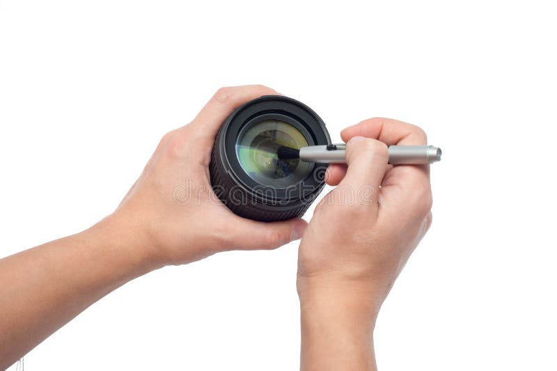 Cleaning the lens stock photo. Image of duster, reflection - 46210928