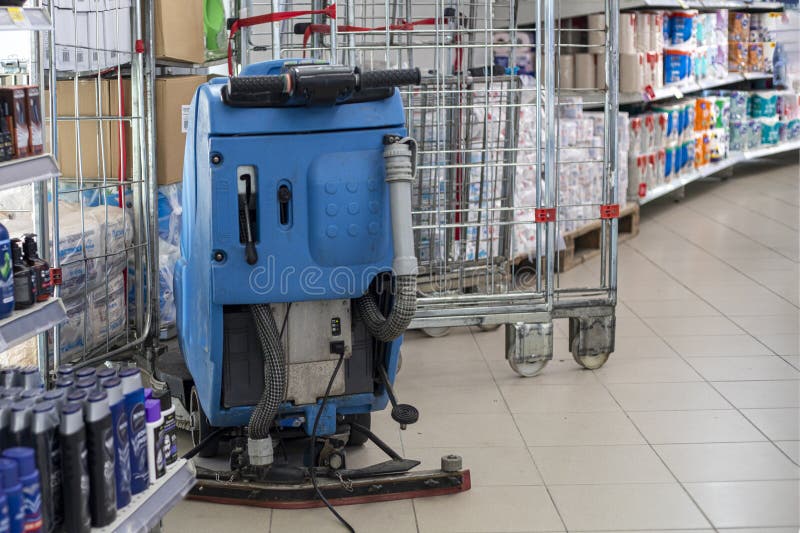 Cleaning Machine Garbage in the Supermarket in the Corner Stock Photo ...
