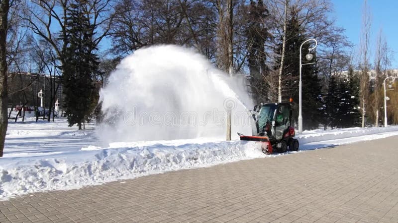 A Cleaning Machine with Snow Blower. Janitor Cleans Winter Park with ... A Cleaning Machine with Snow Blower. Janitor Cleans Winter Park with ...