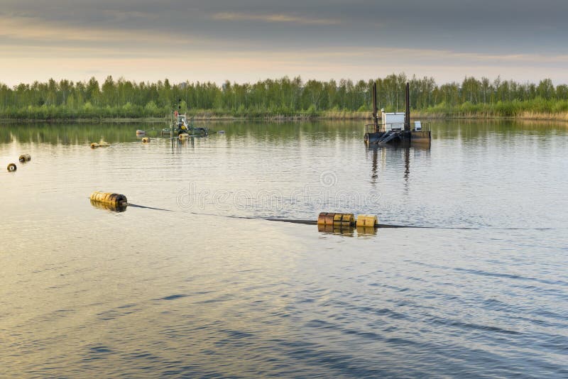 Cleaning Machines in the Pond Stock Image - Image of action, dredge ...