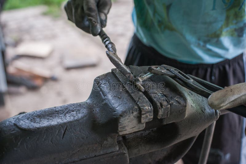 Cleaning Metal with a Hammer after Welding Stock Image - Image of ...