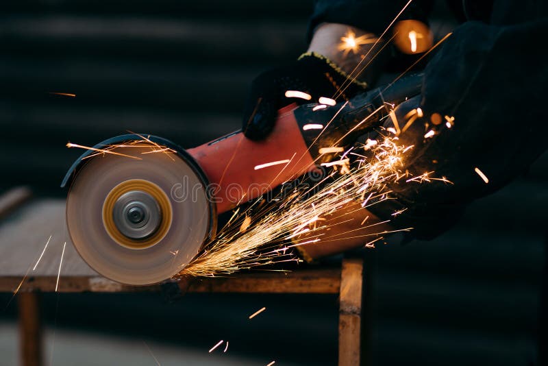Cleaning Metal Structures with an Angle Grinder. Stock Photo - Image of ...