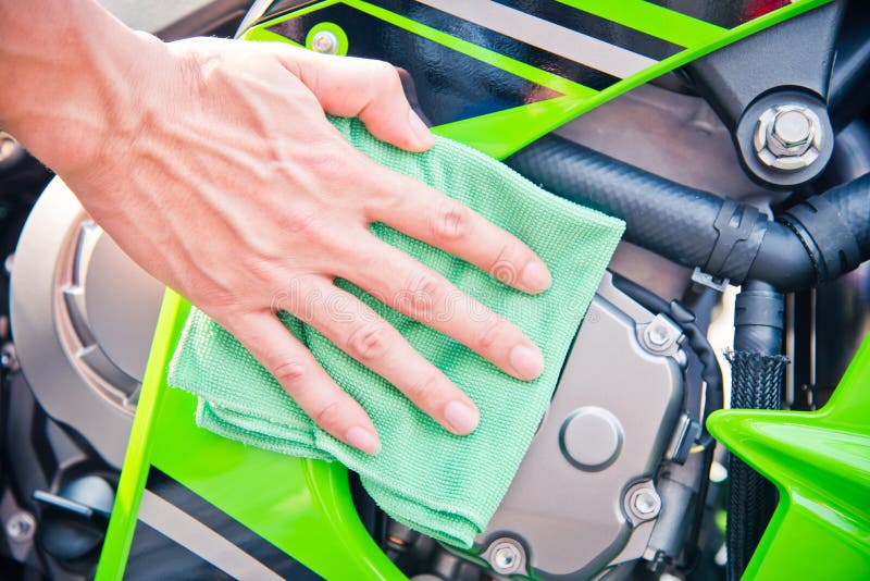 Cleaning motorcycle stock image. Image of cleaning, green - 101774483