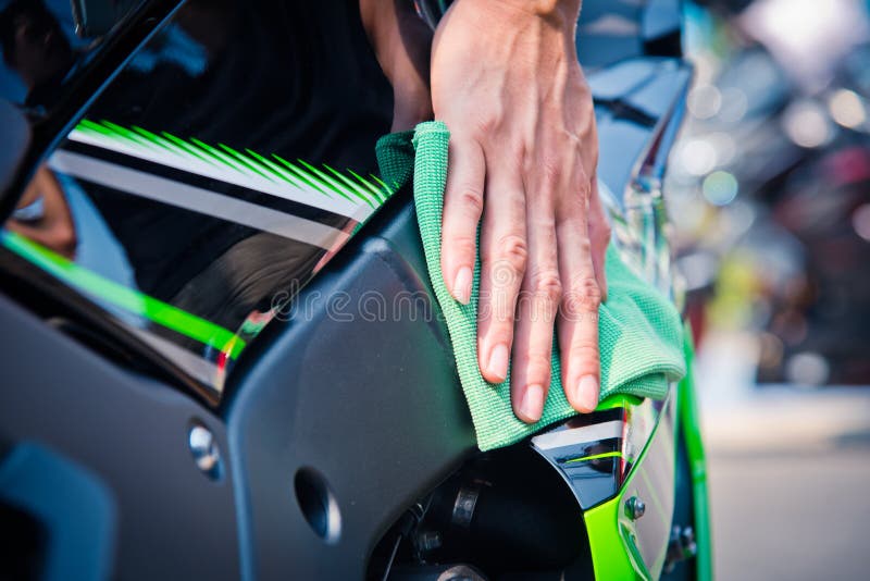 Cleaning motorcycle stock image. Image of polishing - 101775601