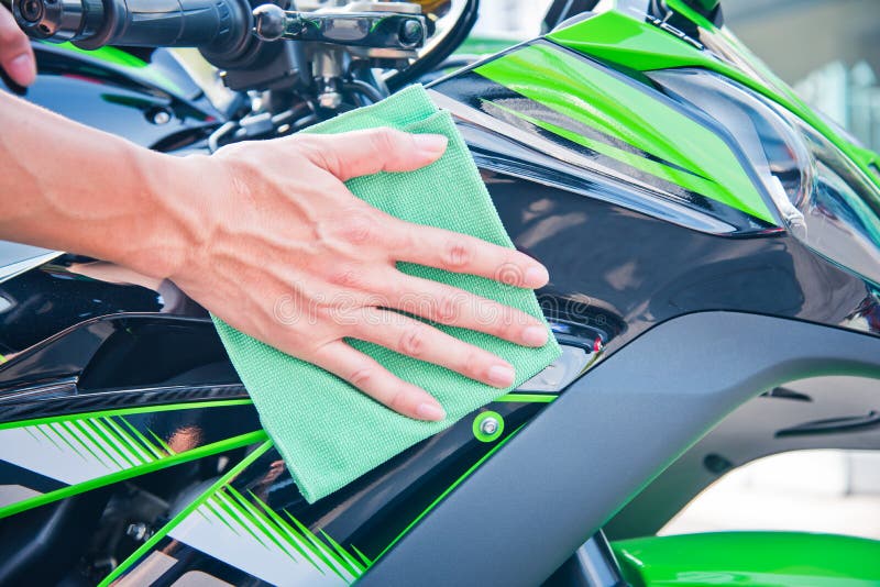 Cleaning motorcycle stock photo. Image of green, detailing - 101774148