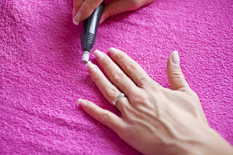 Cleaning nails stock photo. Image of covers, cover, painting - 16121836