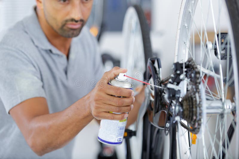 Cleaning and Oiling Bicycle Chain and Gear with Oil Stock Image - Image ...
