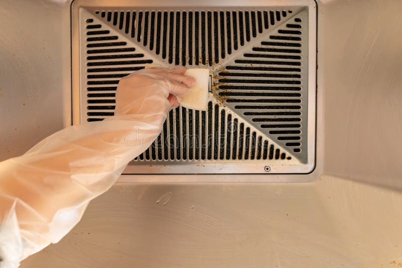 Cleaning an Oily Filter Hood by Sponge from Kitchen Ventilator Stock ...
