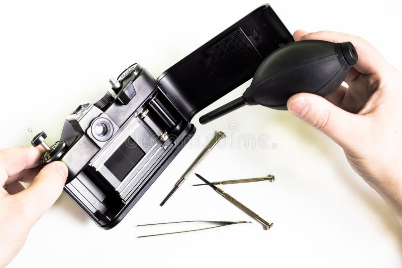 Cleaning of Old Camera Using Air Bulb Stock Photo - Image of camera ...
