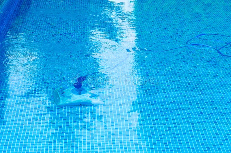 Cleaning the Pool Bottom with an Underwater Vacuum Cleaner Stock Photo ...