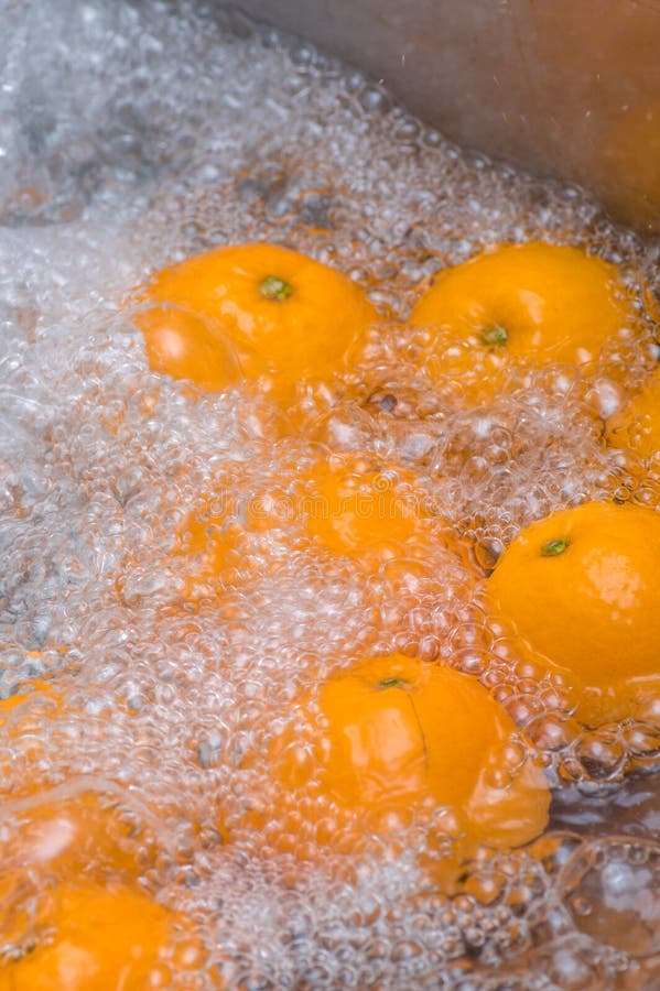 The Cleaning Process of Oranges Stock Image - Image of spray, orange ...
