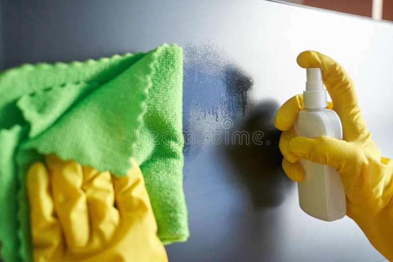 Cleaning Process with Yellow Gloves: Hands Using Cleaning Spray and ...