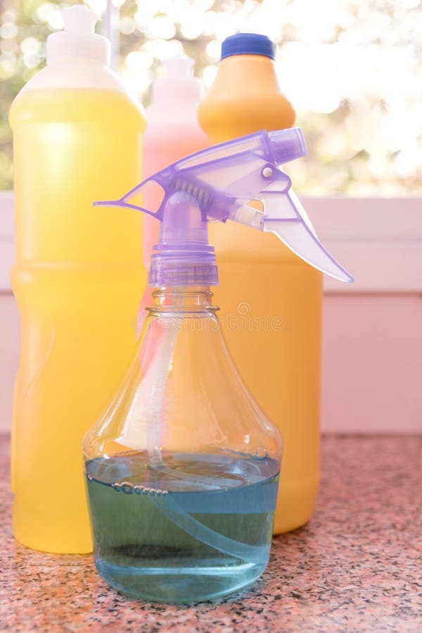 Spray Bleach Clothes on a Blue Background Stock Photo - Image of ...