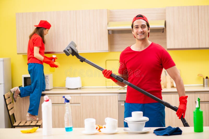 The Cleaning Professional Contractors Working at Kitchen Stock Photo ...