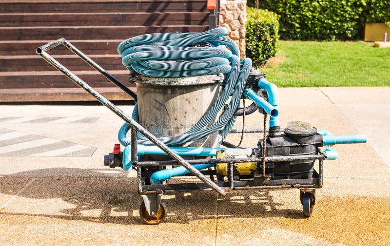 Cleaning Pump Working for a Swimming Pool Stock Photo - Image of grass ...