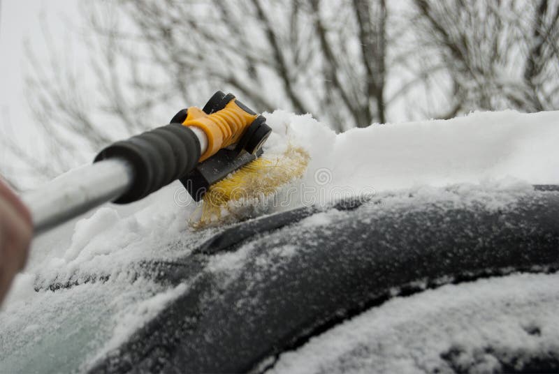 Cleaning the Roof of the Car from Snow. Stock Photo - Image of freeze ...
