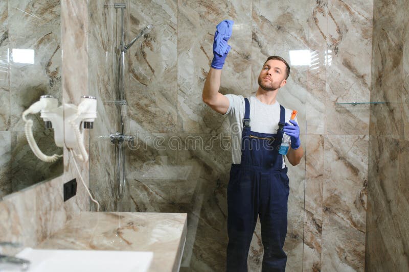 Cleaning Service, a Man Cleans the Bathroom Stock Photo - Image of ...