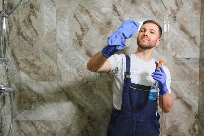 Cleaning Service, a Man Cleans the Bathroom Stock Photo - Image of ...
