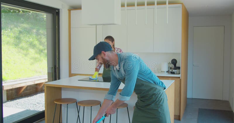 Cleaning Service Team at Work in Kitchen. Stock Photo - Image of clean ...