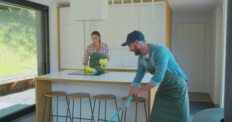 Cleaning Service Team at Work in Kitchen. Stock Image - Image of ...