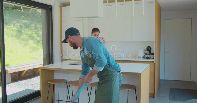 Cleaning Service Team at Work in Kitchen. Stock Image - Image of ...