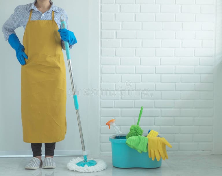 The Cleaning Staff Use Mops on the Surface and Use Cleaning Agents ...