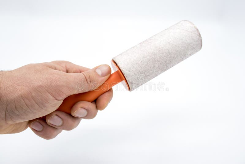 Cleaning Sticky Roller with Orange Handle on White Background Stock ...