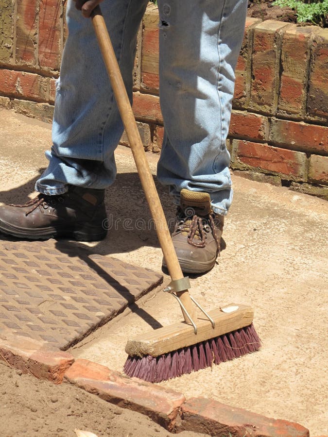 Cleaning/sweeping stock photo. Image of serviceman, jeans - 7663758