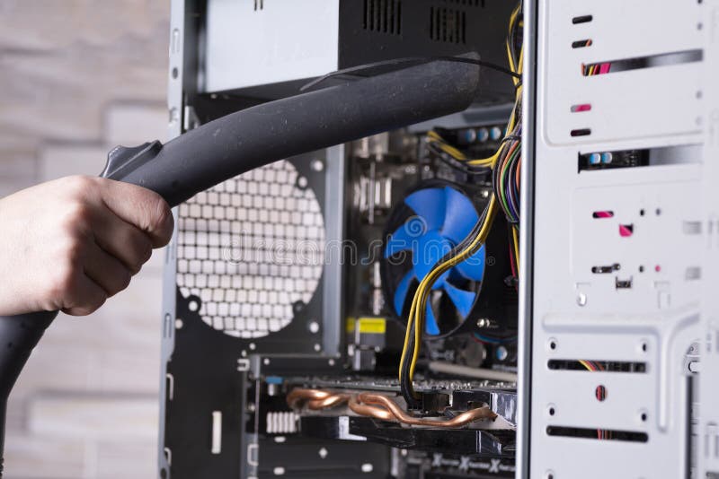 Cleaning the System Unit of a Desktop Computer from Dust with a Vacuum ...