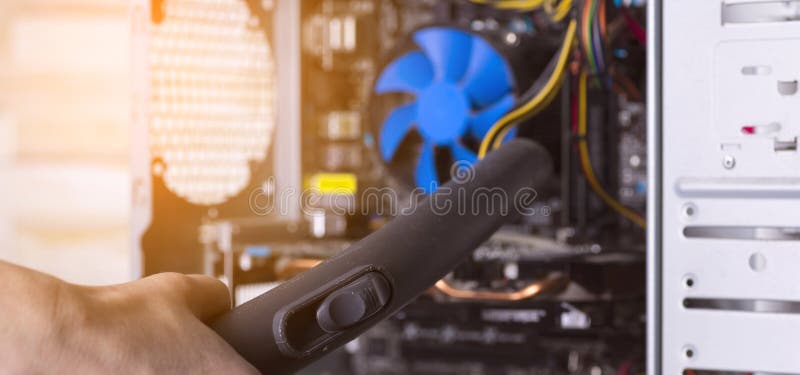 Cleaning the System Unit of a Desktop Computer from Dust with a Vacuum ...