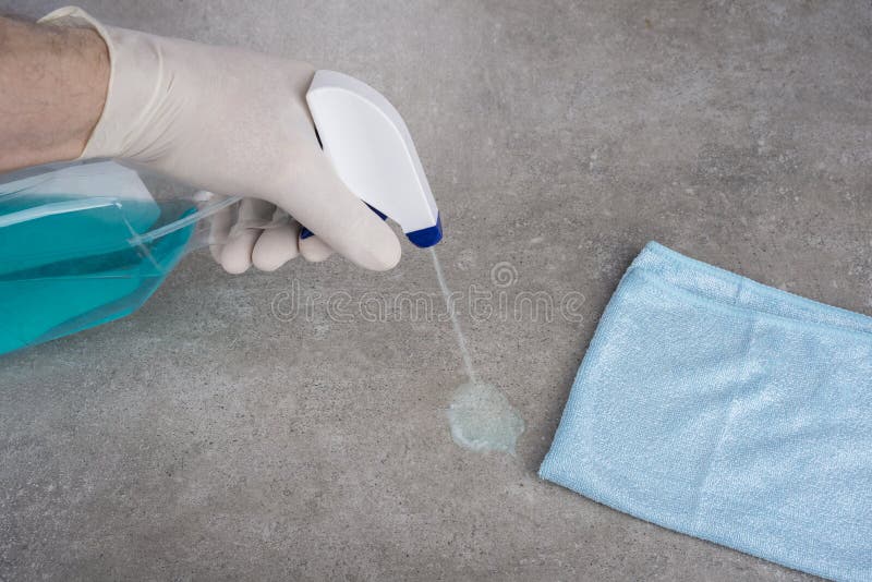 Cleaning Table with a Disinfecting Spray. Spraying on a Surface To ...