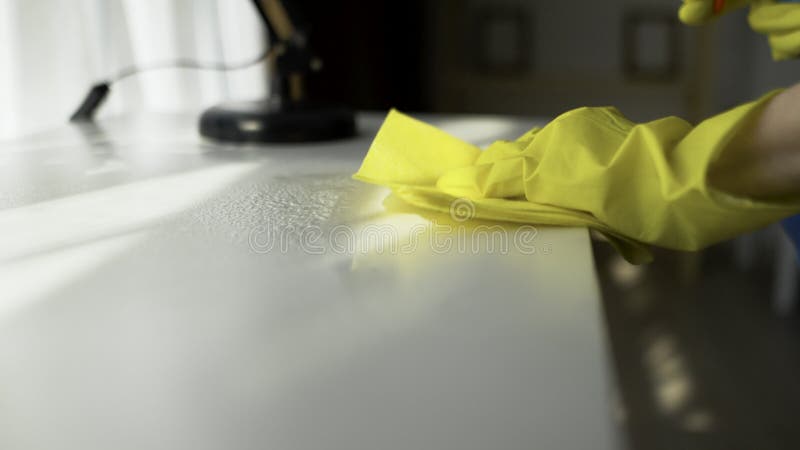 Cleaning the Table with Spray Detergent, Cloth on Work Surface. Concept ...