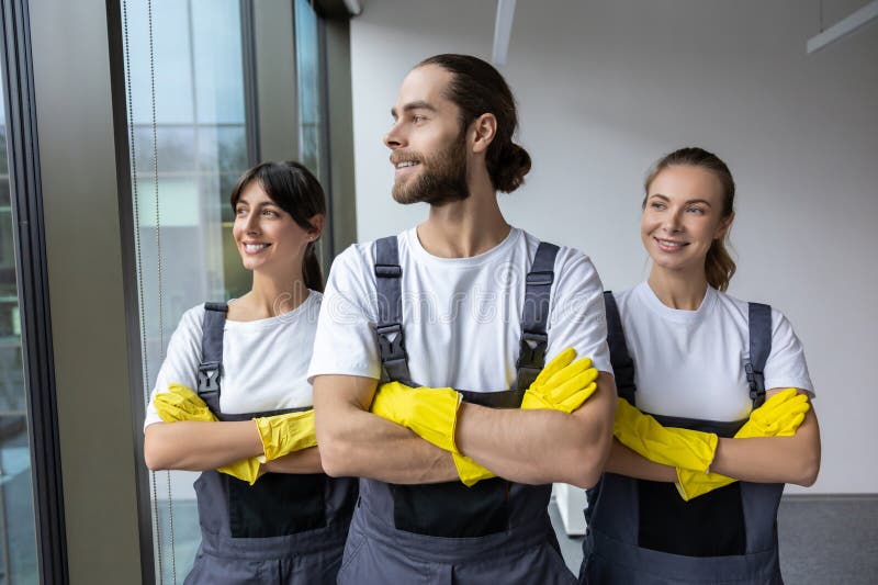 Cleaning Team after Work in the Office Looking Contented and Confident ...