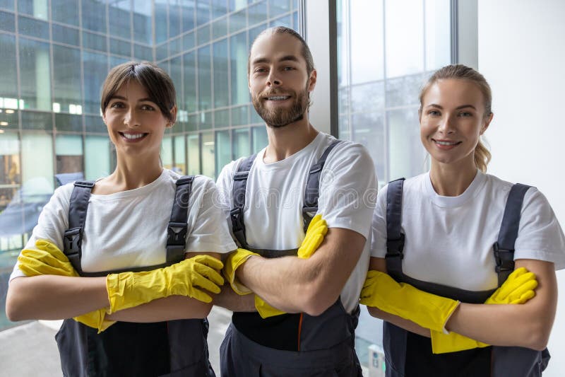 Cleaning Team Work Office Looking Contented Confident Stock Photos ...