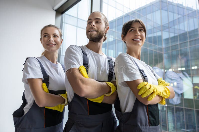 Cleaning Team after Work in the Office Looking Contented and Confident ...