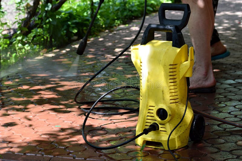 Cleaning Tiles with a High Pressure Washer Stock Image - Image of ...